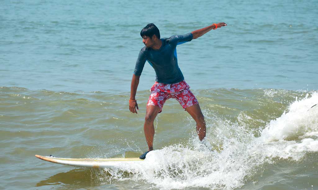 Surfing in Covelong Point
